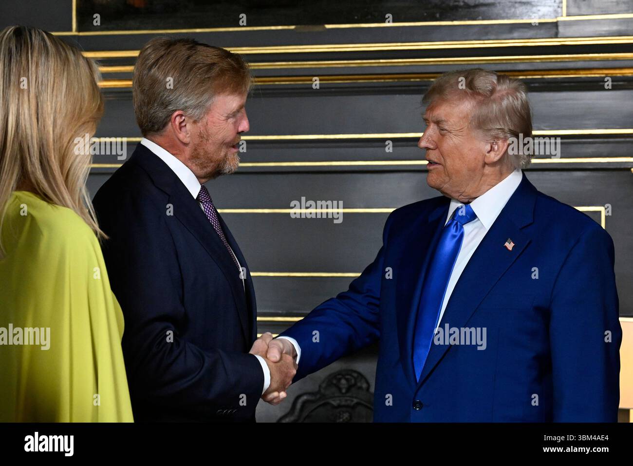 President Donald Trump, right, is welcomed by Netherland's King Willem ...