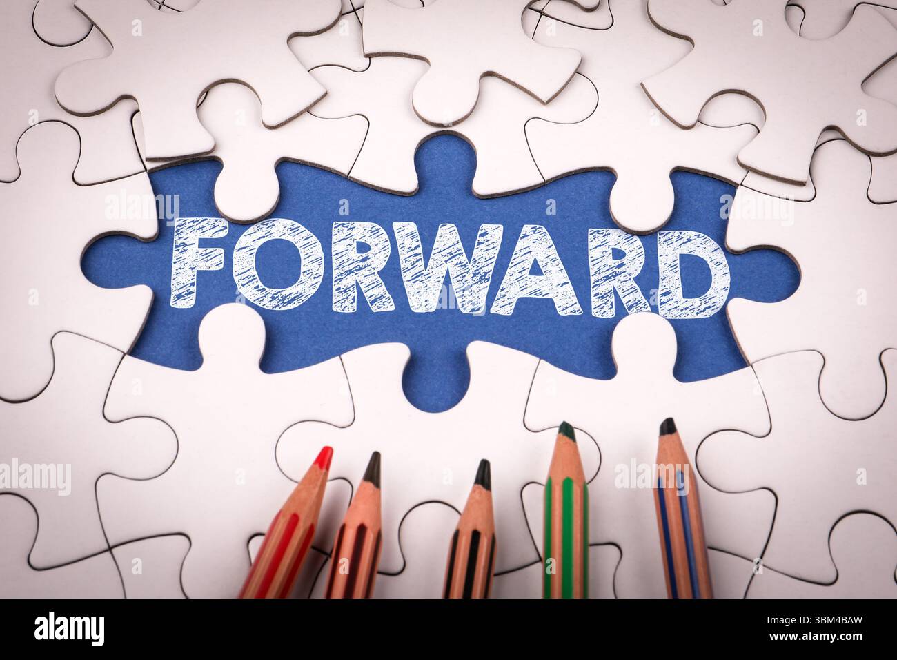 Forward Concept. White puzzle pieces and colored pencils Stock Photo ...