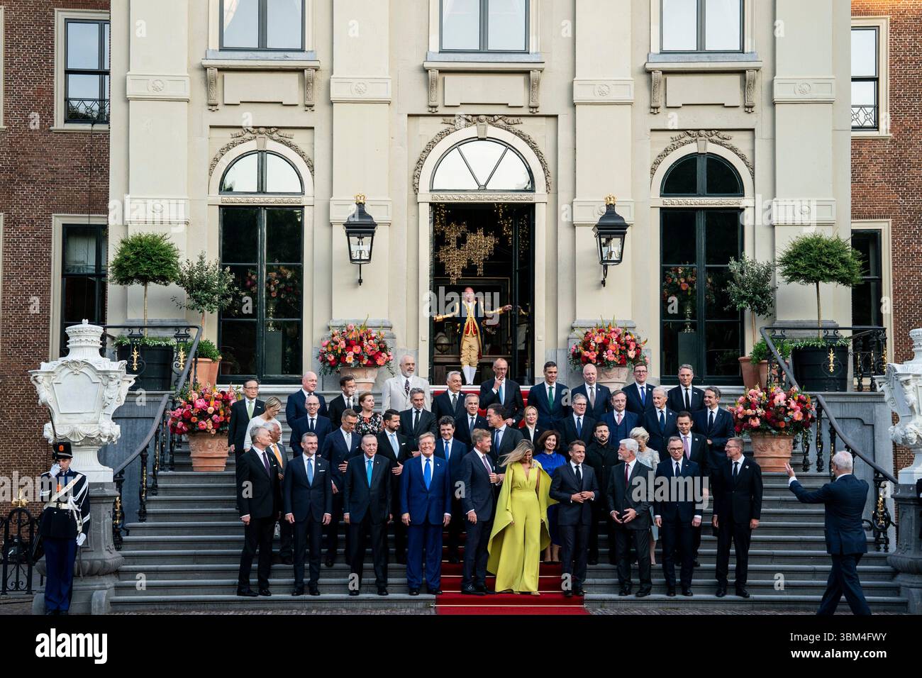 Participants poses for a family photo at the 2025 NATO summit in The ...