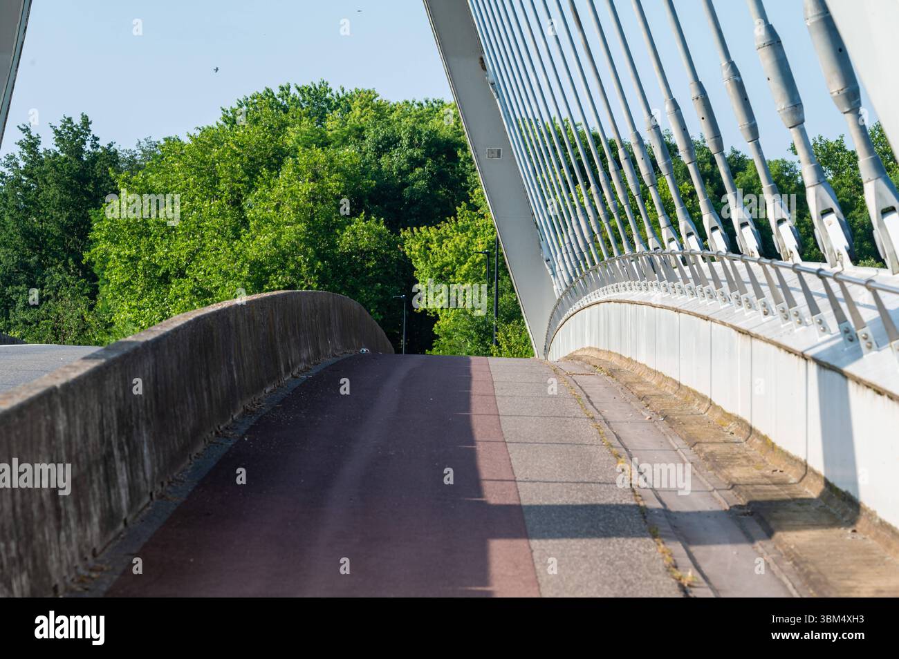 Arched cable bridge over the Albert canal in Meerhout, Antwerp Province ...