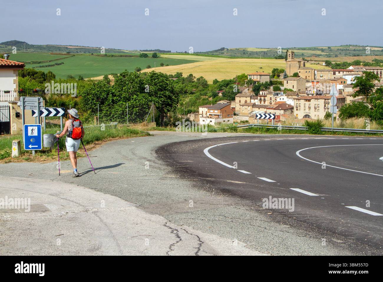 Pilgrim woman walking the Camino de Santiago the way of St James ...