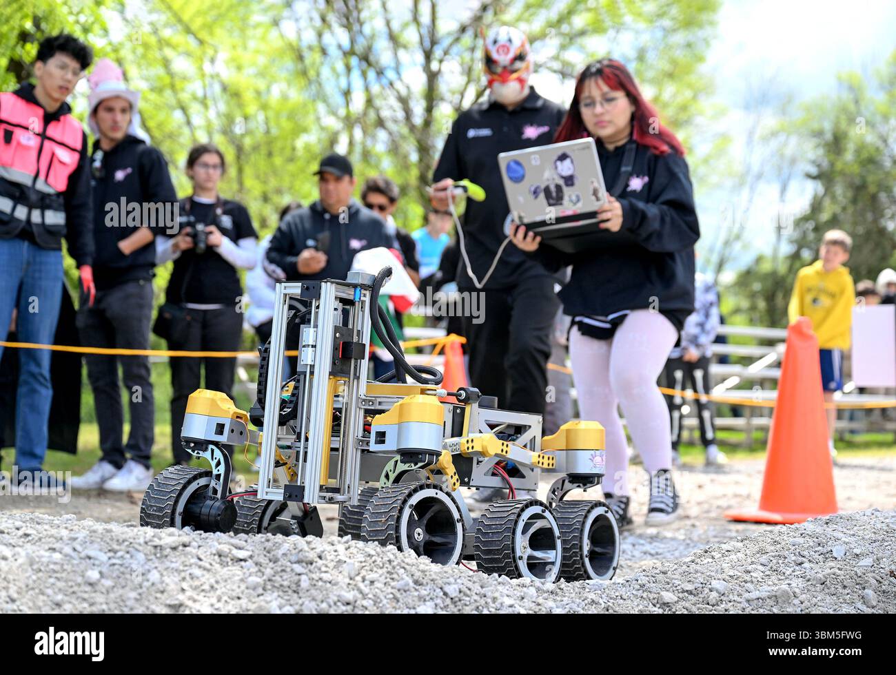 April 11, 2025 - USA - Two students guide their rover through an ...