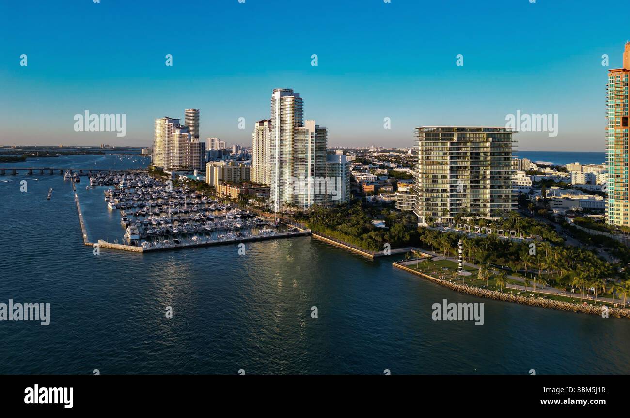 Yacht docked at Miami marina. Aerial view of coastline in Miami ...