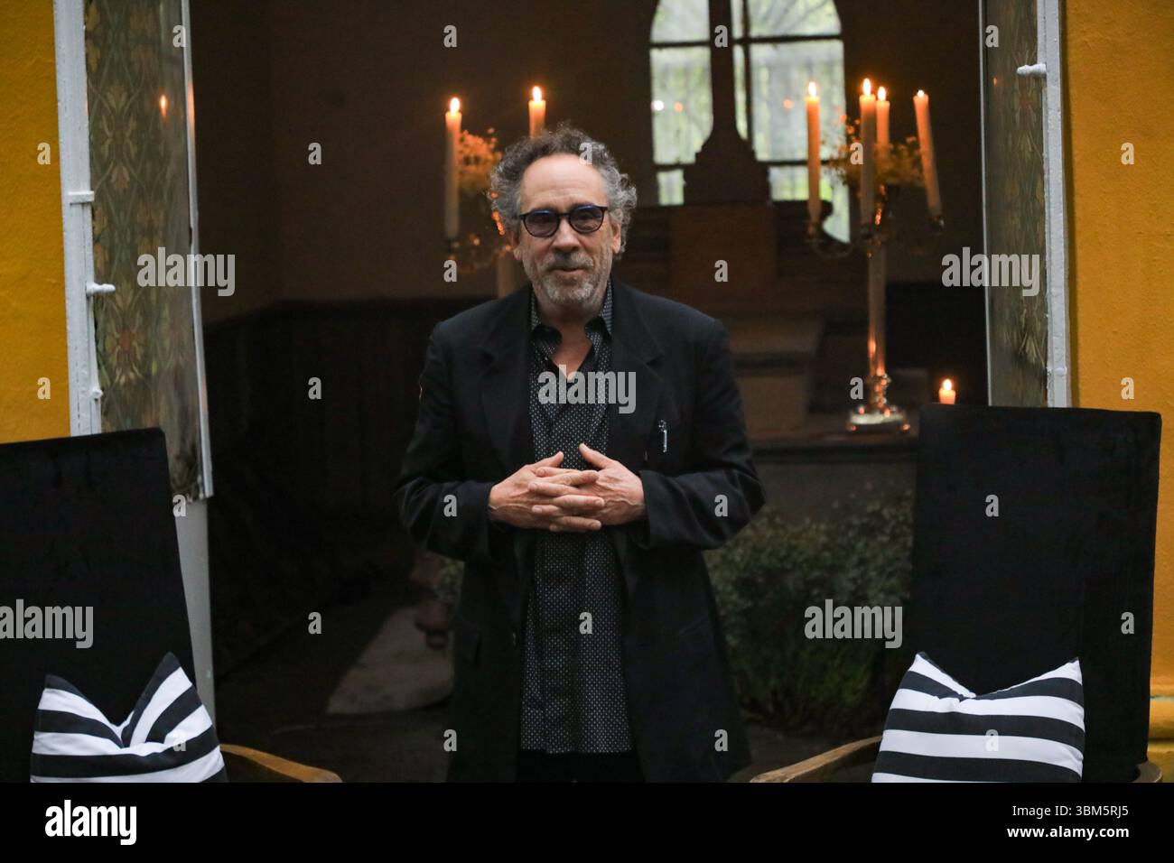 Director, producer, screenwriter, and cartoonist, Tim Burton poses ...
