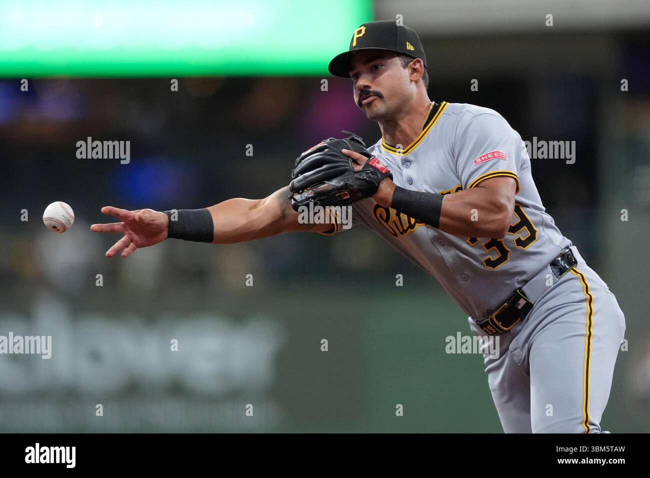 Pittsburgh Pirates' Nick Gonzales throws to first base during the first ...