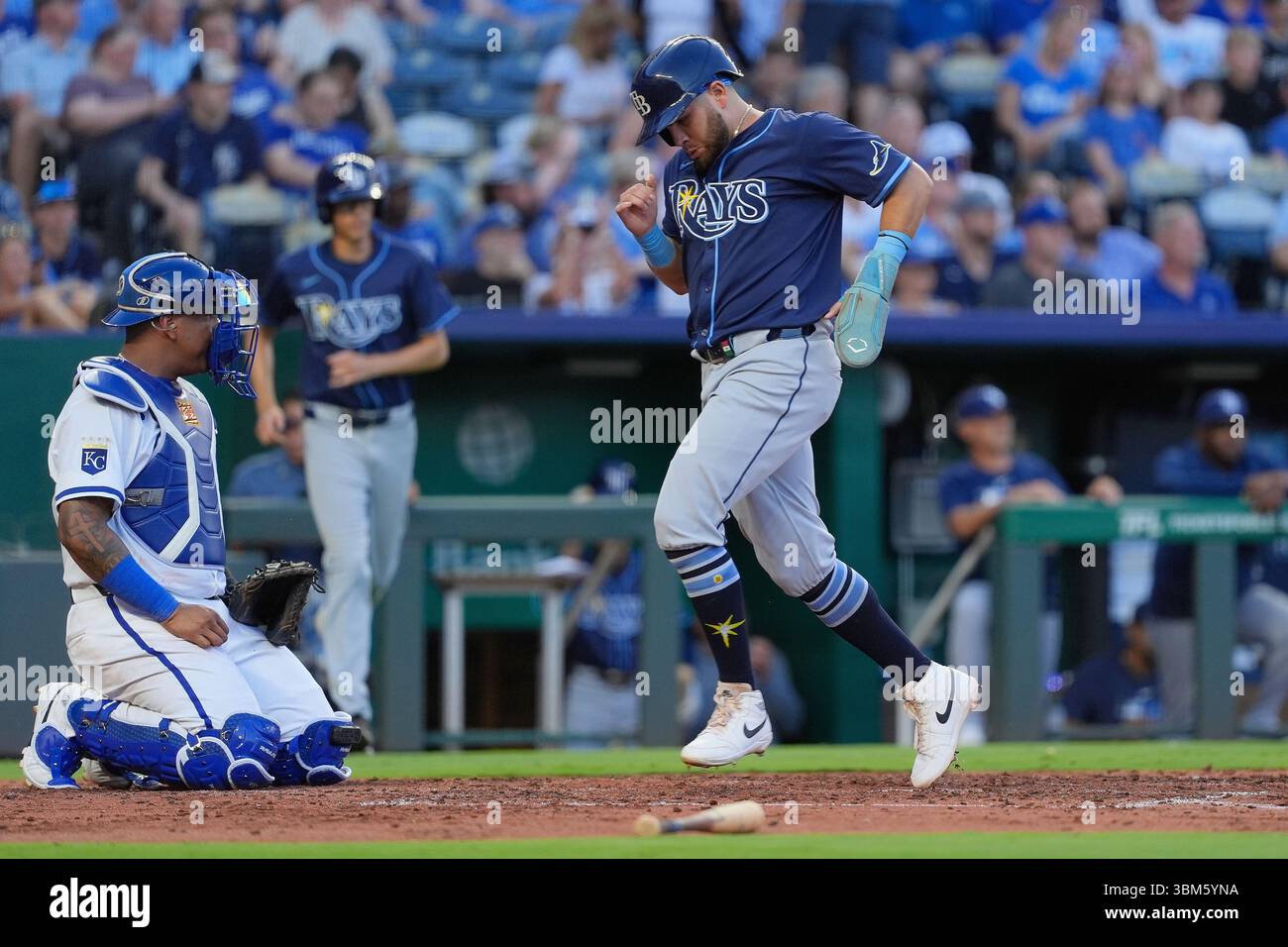 Tampa Bay Rays' Jonathan Aranda runs home to score on a sacrifice fly ...