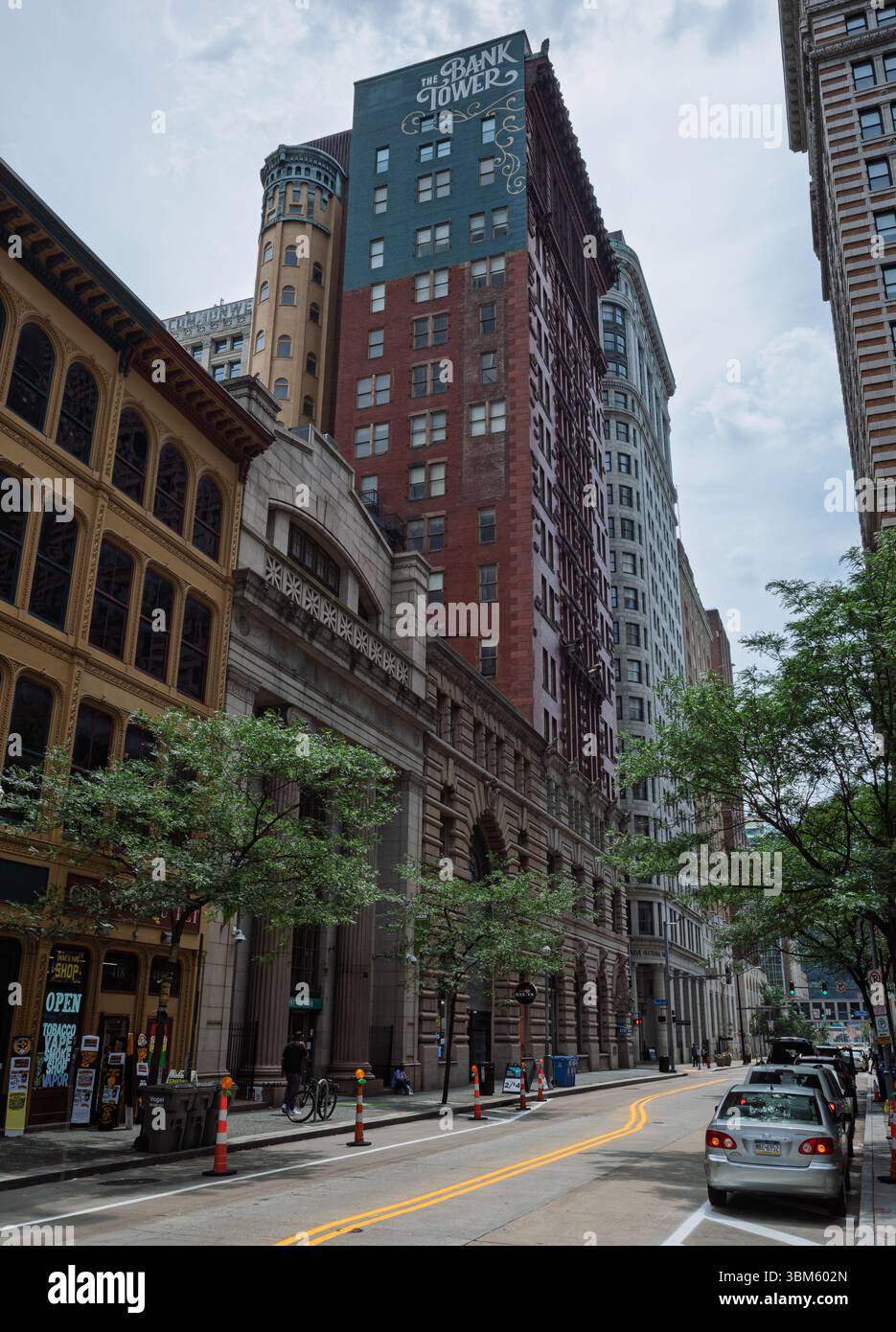 A dynamic downtown Pittsburgh streetscape showcasing a blend of ...