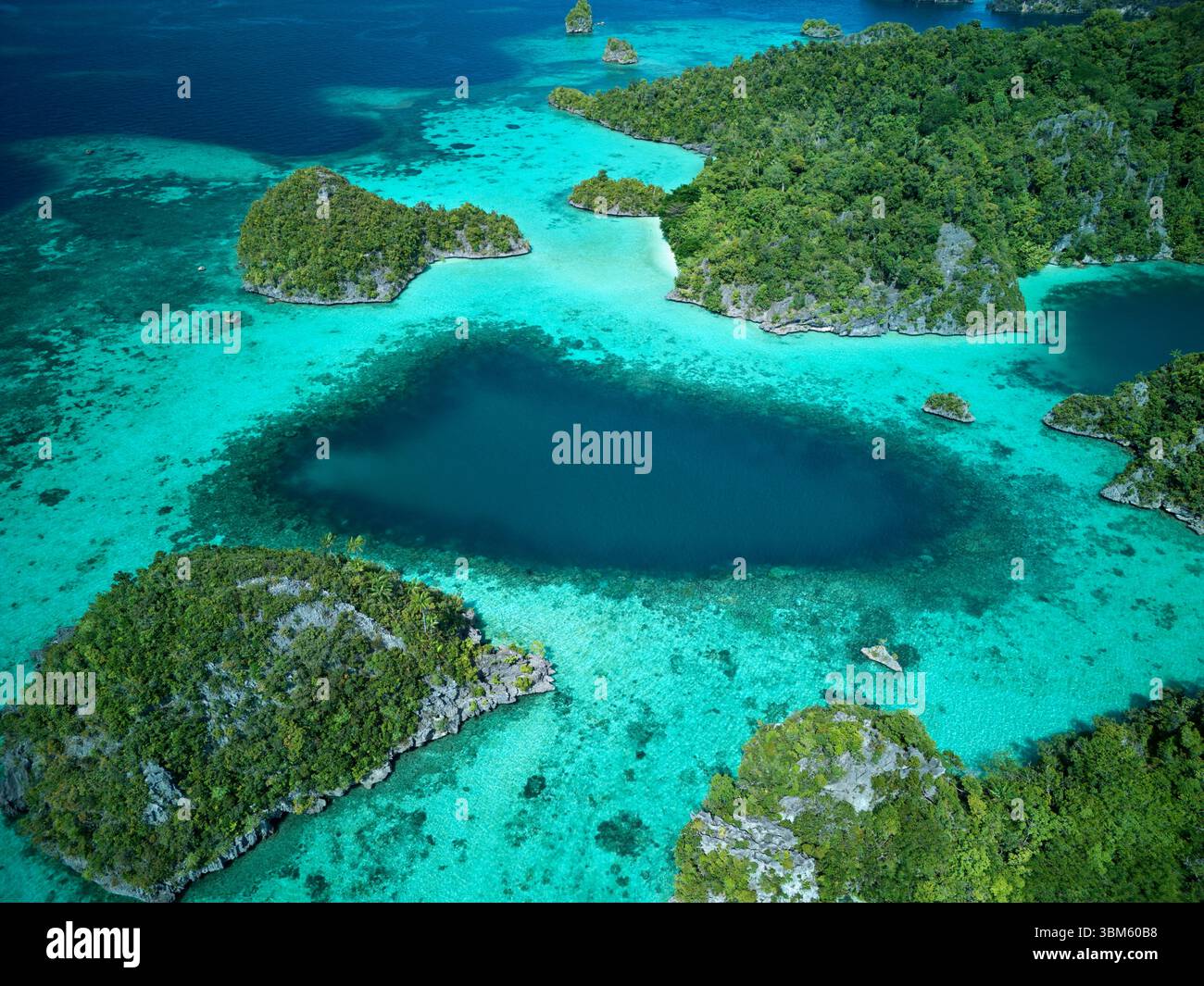 Karst formations and coral reefs, Lenmakana, outer archipelago, Misool ...