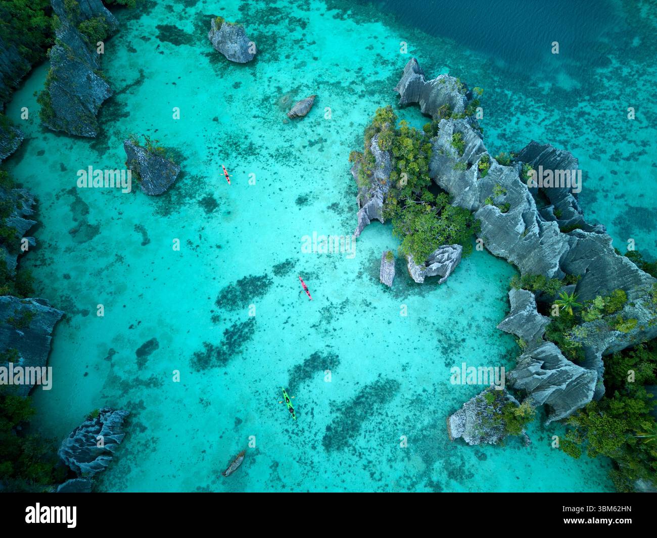 Karst islands and kayaks, inner archipelago, Misool, Raja Ampat ...