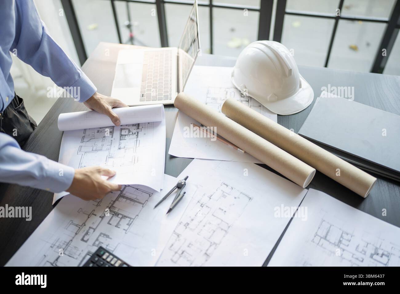 Architecture Man drawing on architectural Creative project business ...