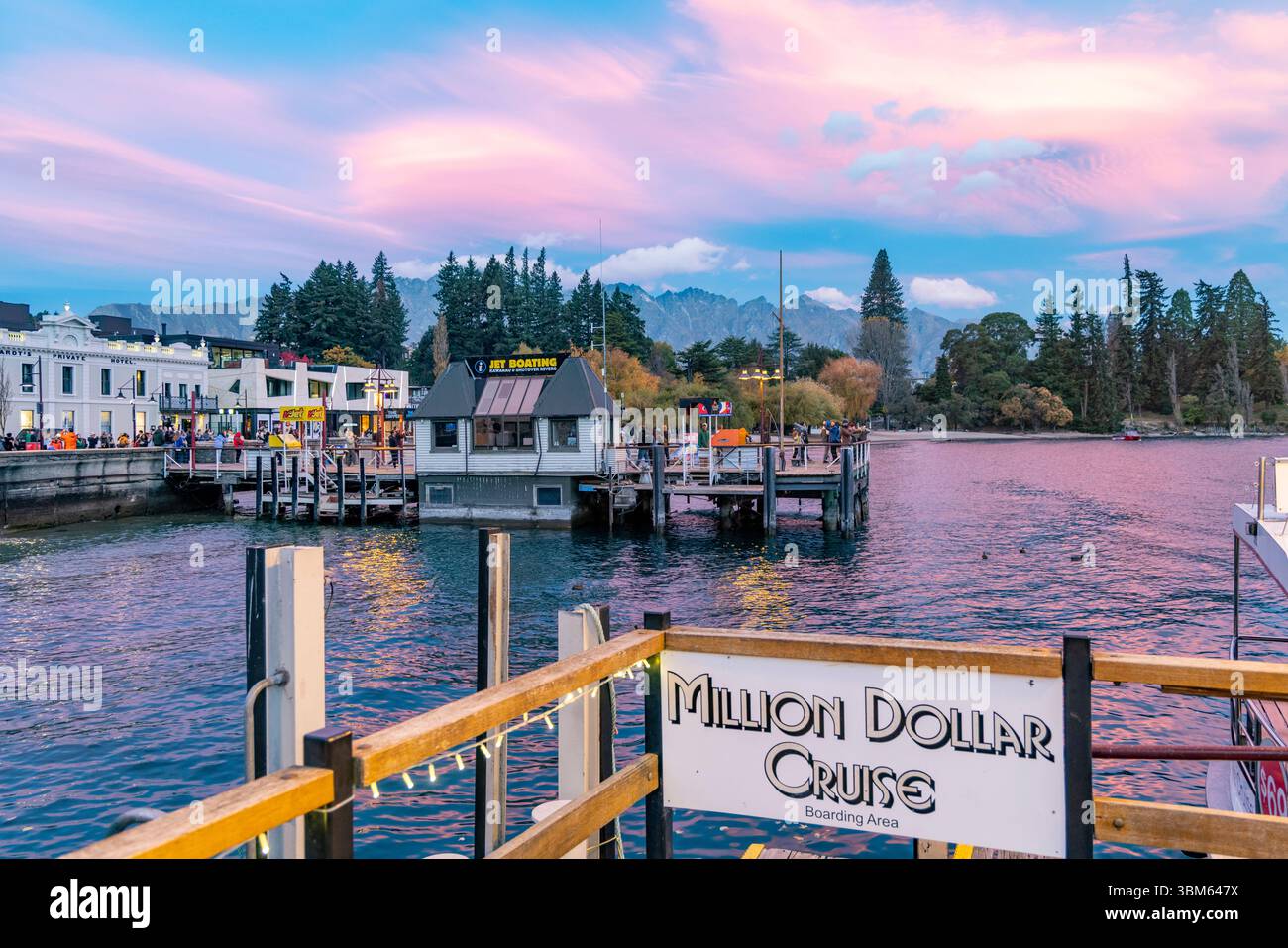 Lake Wakatipu Queenstown, sunset over the lake and main pier wharfs ...