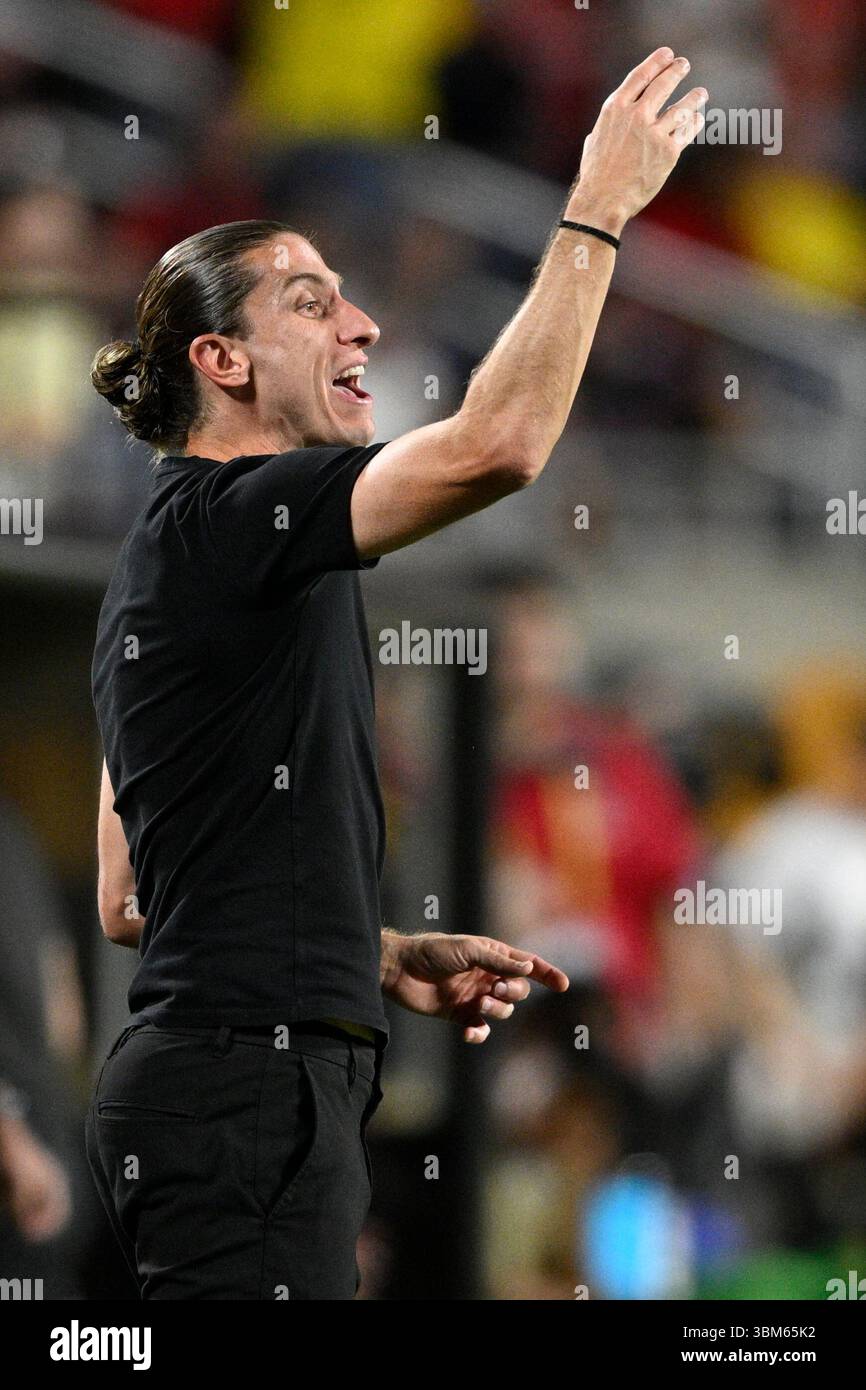 Flamengo's coach Filipe Luis gives instructions to his players during ...
