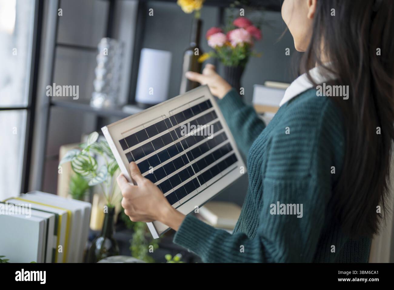 Home owner install solar power systems in her house Asian Woman ...
