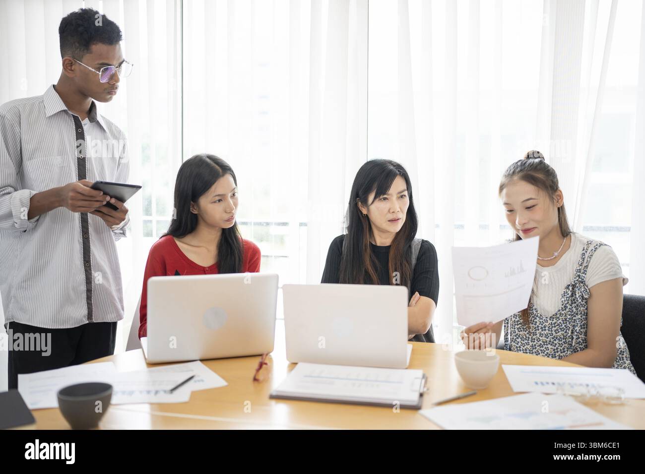 Business people group diverse colleagues team discuss project in bright ...