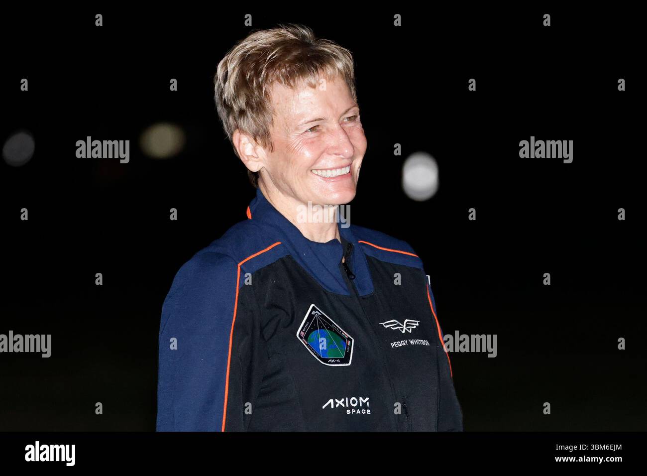 SpaceX Falcon 9 commander Peggy Whitson smiles before departing to pad ...