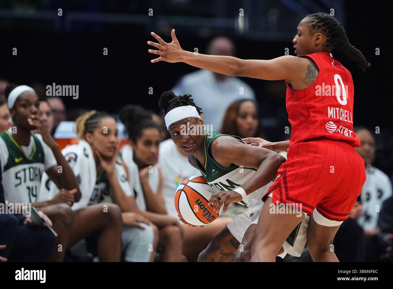 Seattle Storm guard Erica Wheeler, left, tries to look around Indiana ...