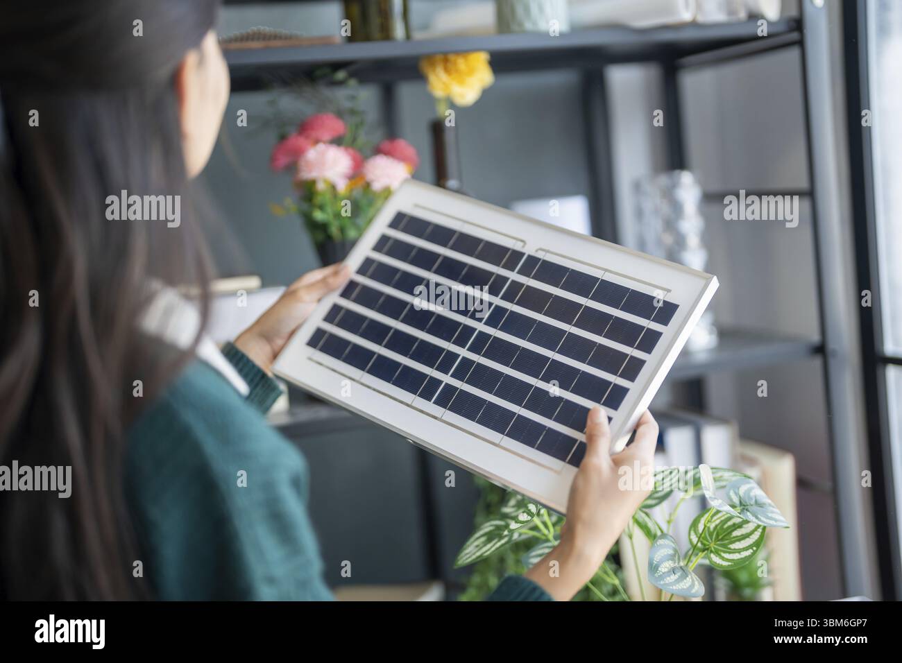 Home owner install solar power systems in her house Asian Woman ...