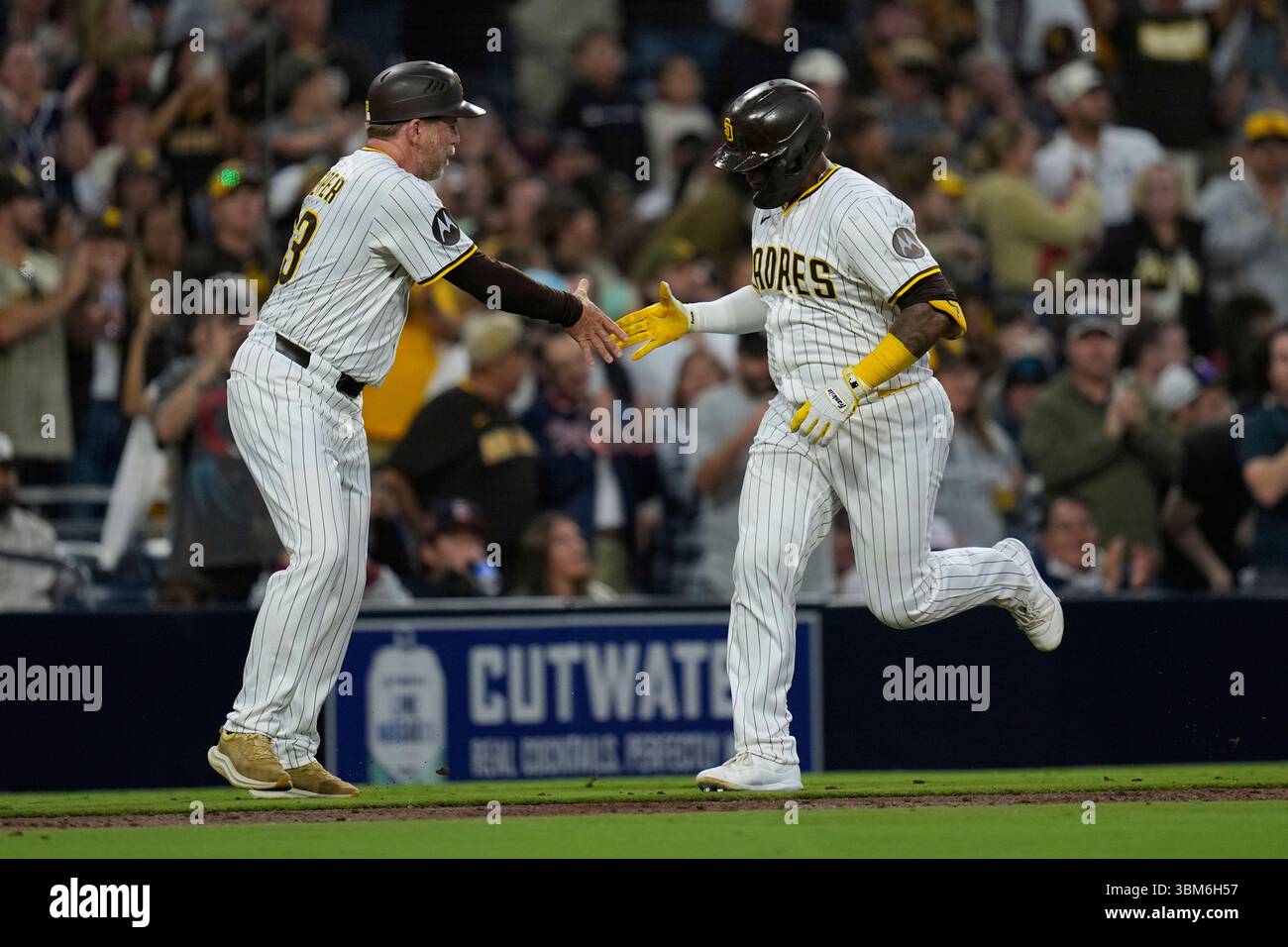 San Diego Padres' Martín Maldonado, right, celebrates with third base ...