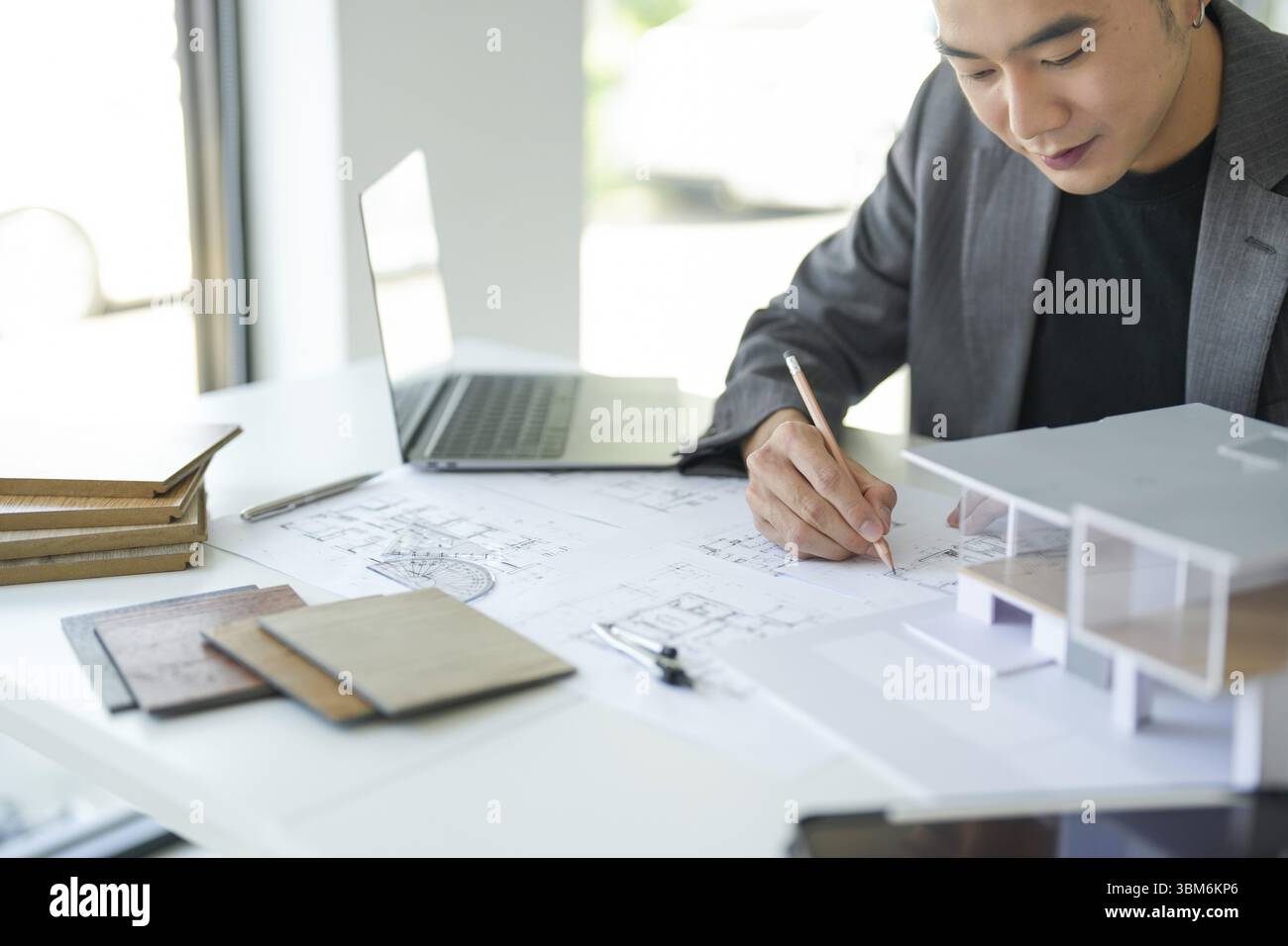 Architecture Man drawing on architectural Creative project business ...