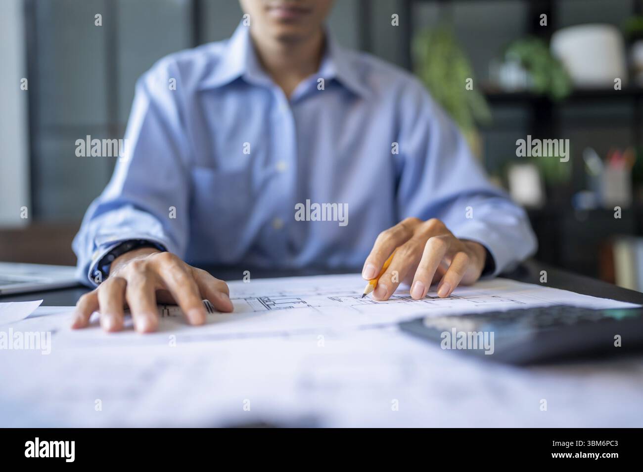 Architecture Man drawing on architectural Creative project business ...