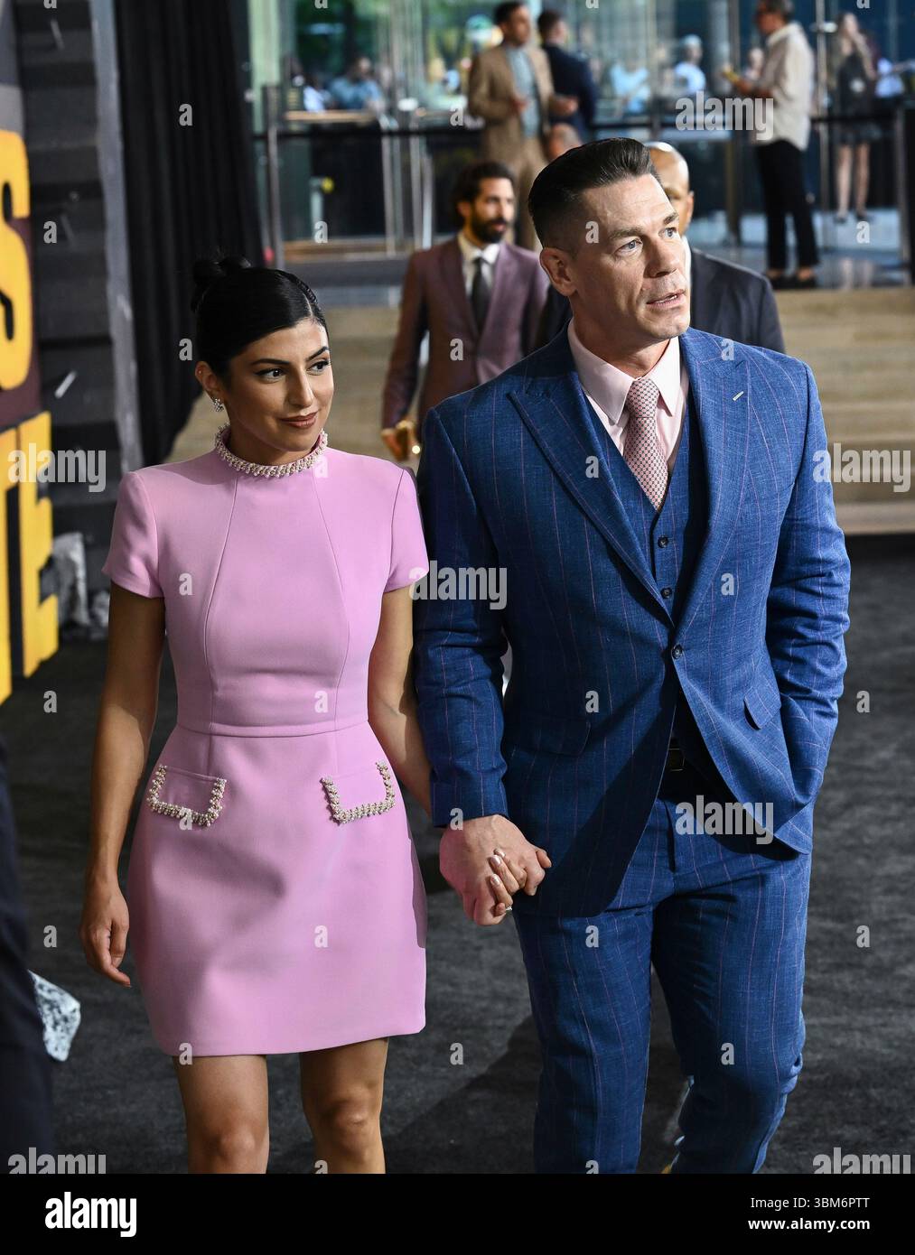 John Cena, right, and wife Shay Shariatzadeh attend the world premiere ...