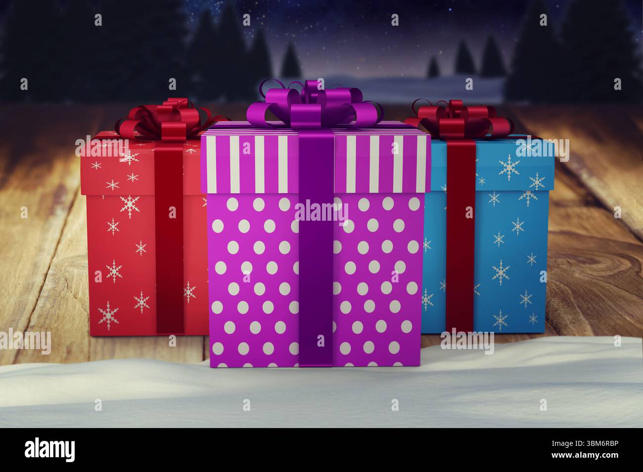 Three decorated gift boxes are sitting on snowy wood under starry night ...