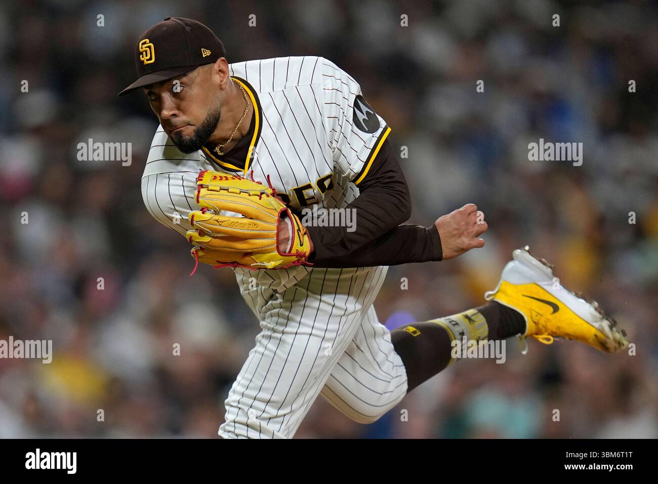 San Diego Padres relief pitcher Robert Suarez works against a ...