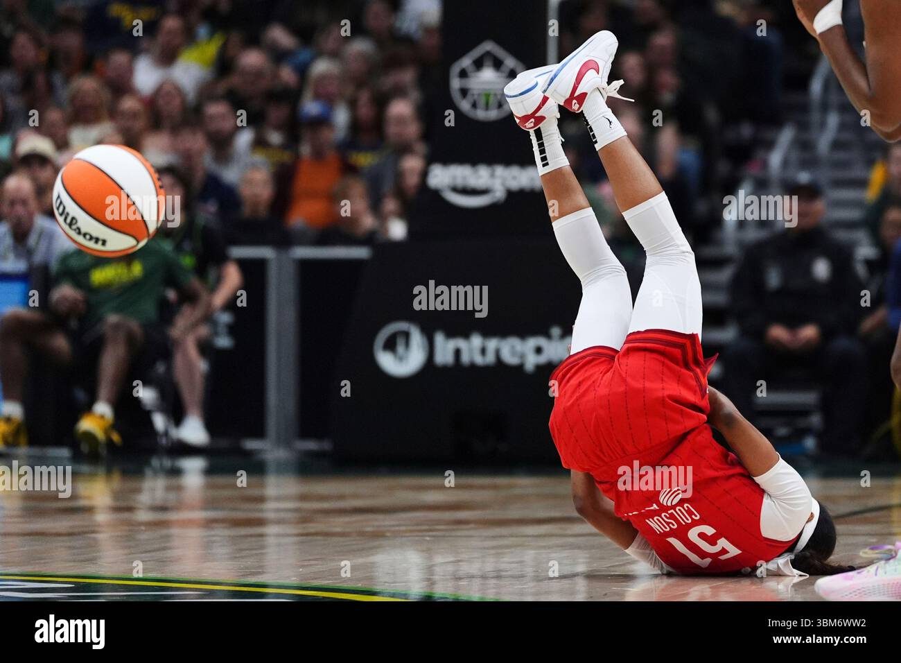 Indiana Fever guard Sydney Colson (51) falls on the court after ...