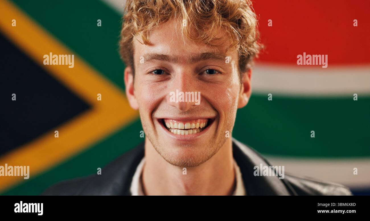 South Africa, happy and portrait of man with flag for national ...
