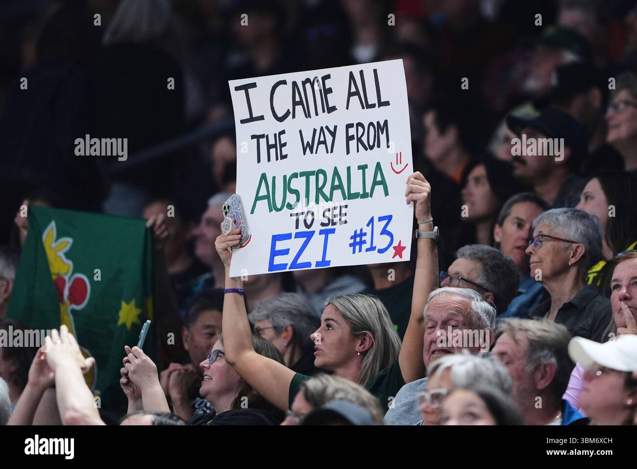 A fan holds a sign for Seattle Storm forward Ezi Magbegor during the ...