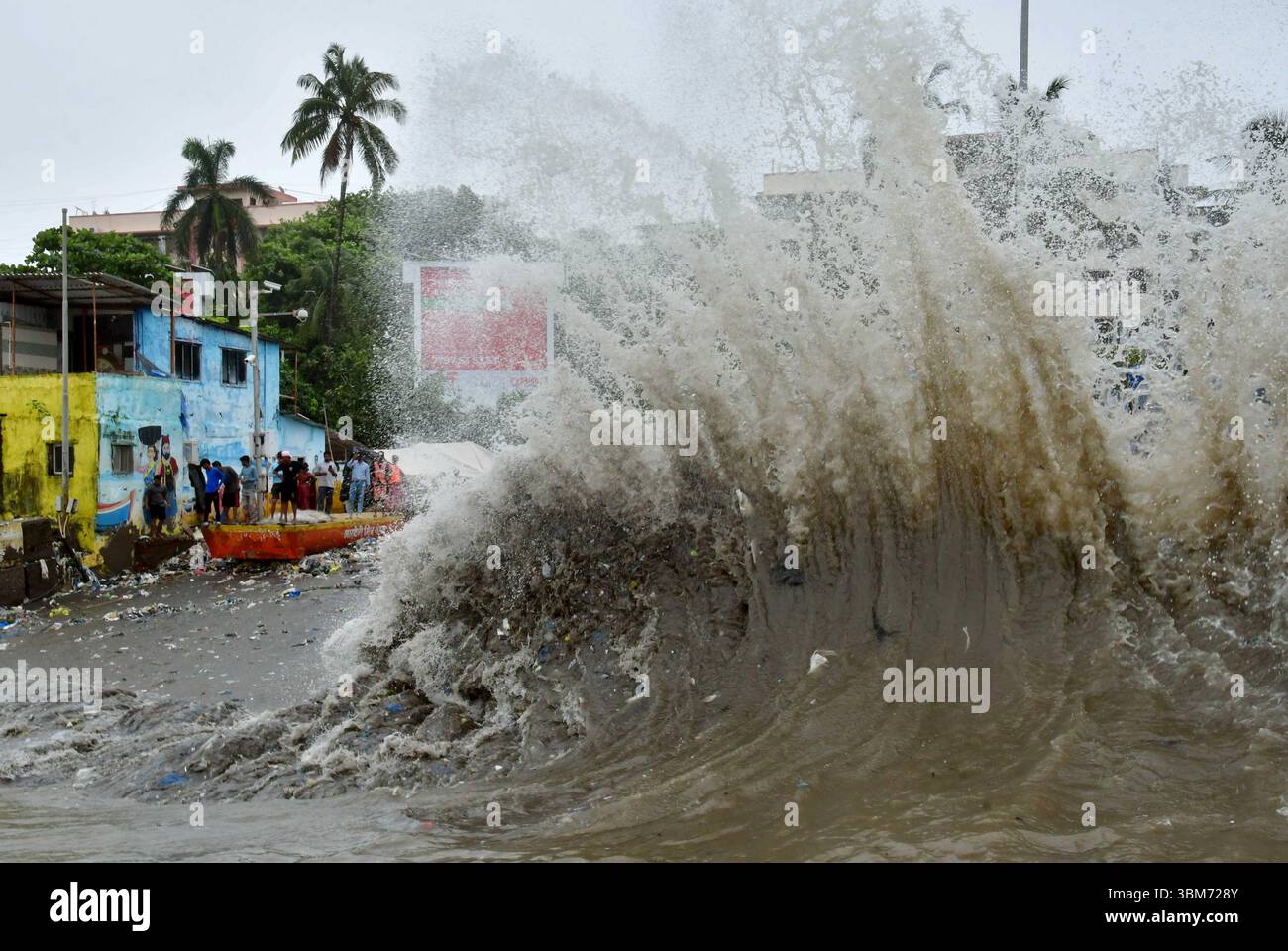 MUMBAI, INDIA - JUNE 24: Sea waves lash the shores with all the garbage ...