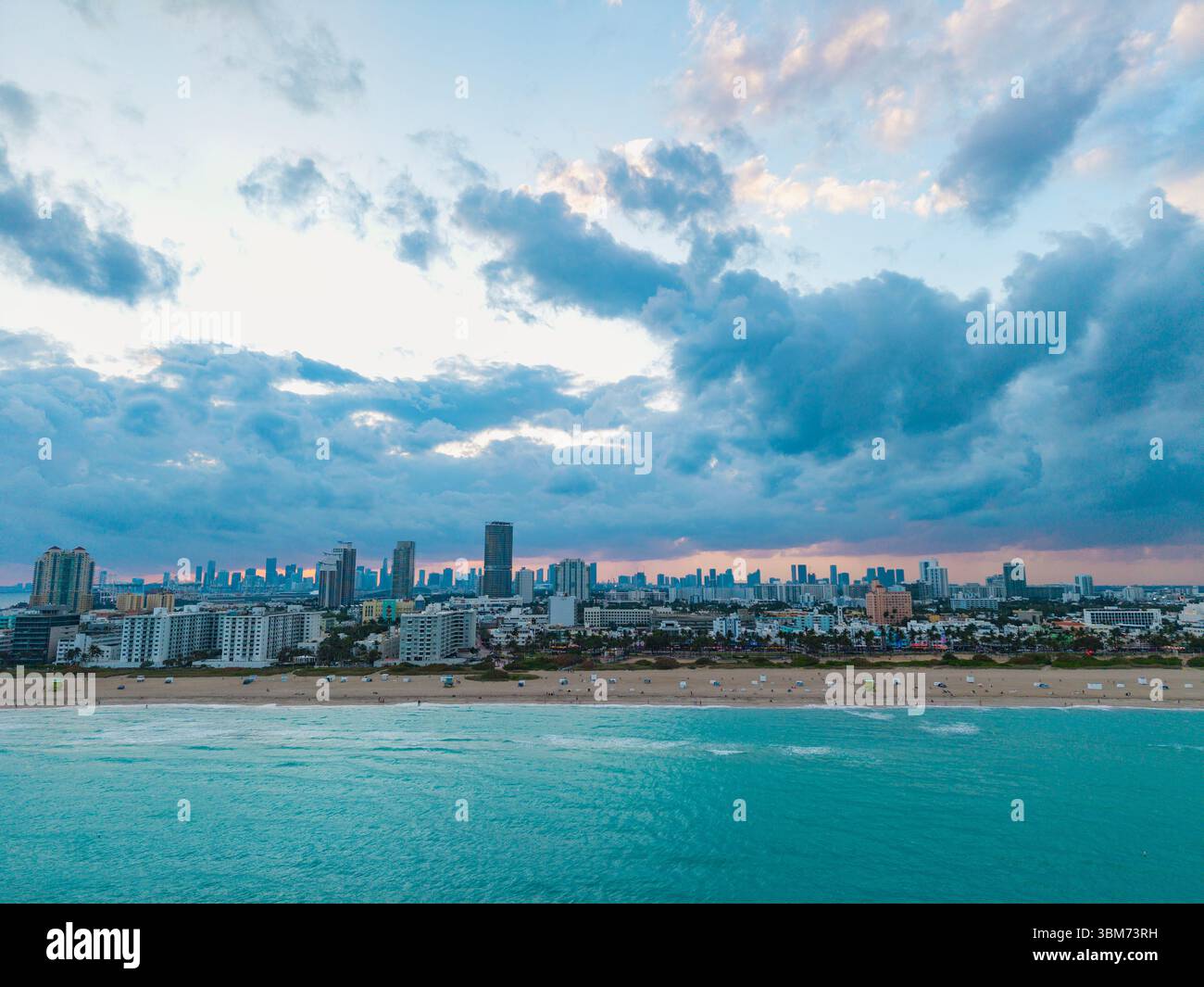 Aerial view of Miami Beach city by the coast. Miami Beach skyline ...