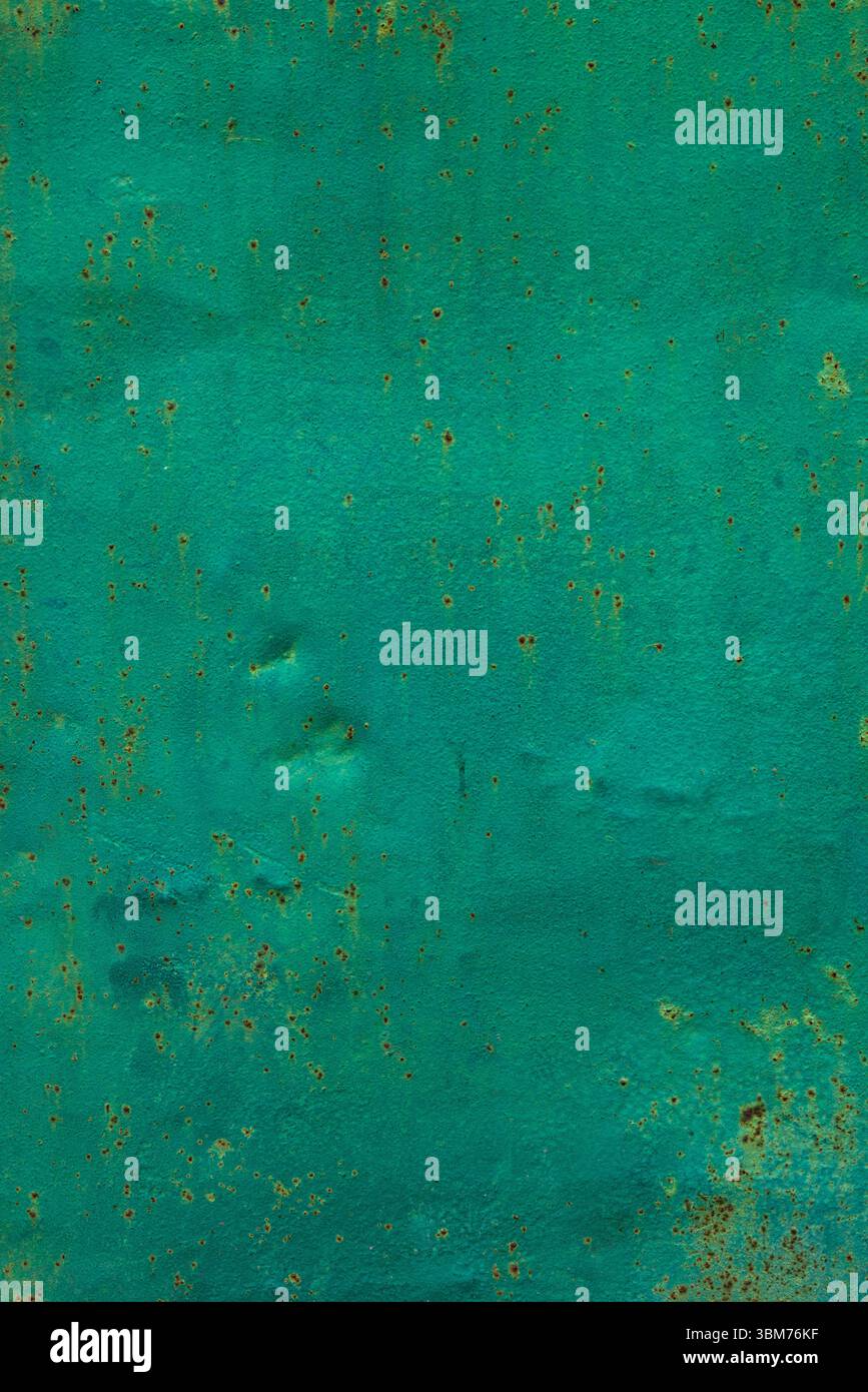 Teal painted metal surface with rust in industrial setting Stock Photo ...