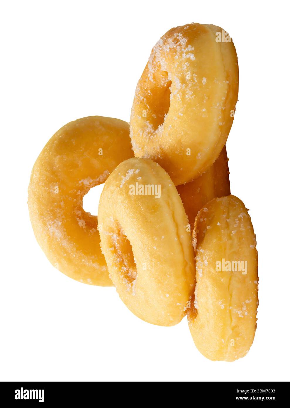 Side view of brown sugar glazed cinnamon donuts in stack is isolated on ...
