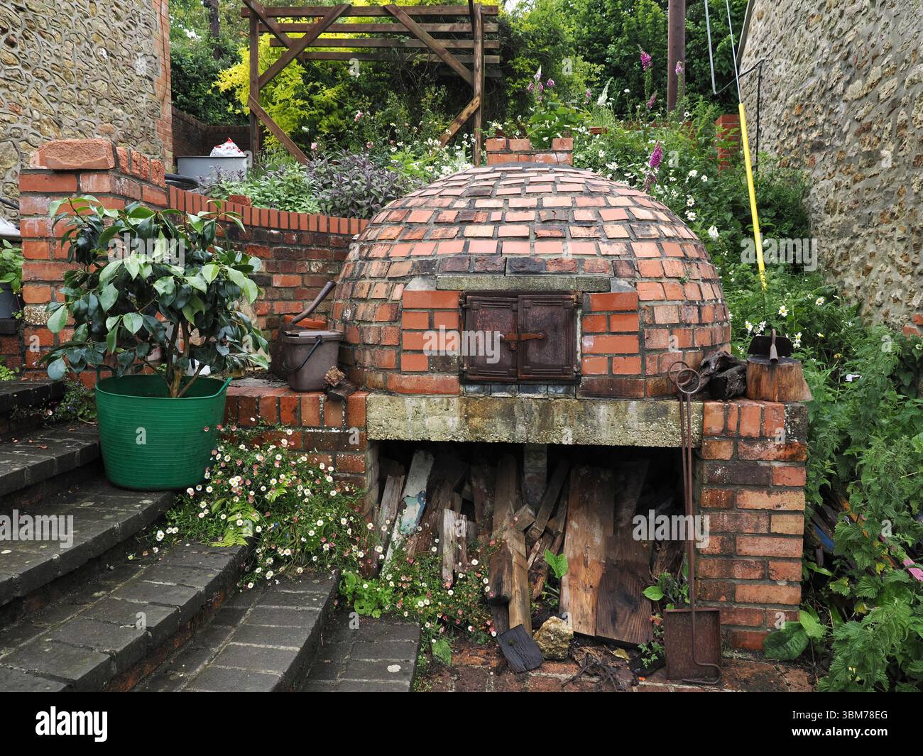 Red brick pizza oven and brickwork steps Stock Photo - Alamy