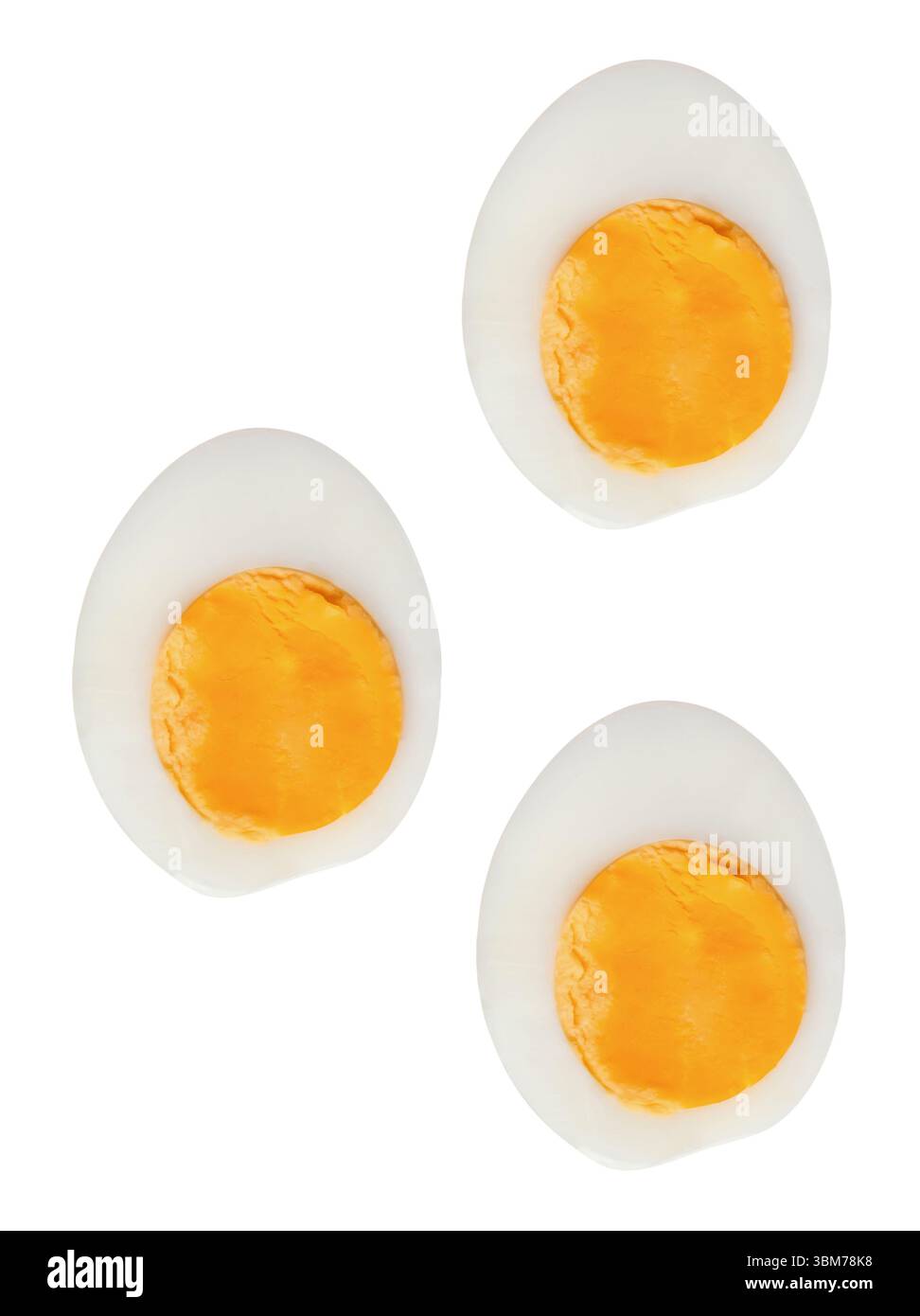 Top view set of unpeeled cooked or boiled chicken eggs in three halves ...
