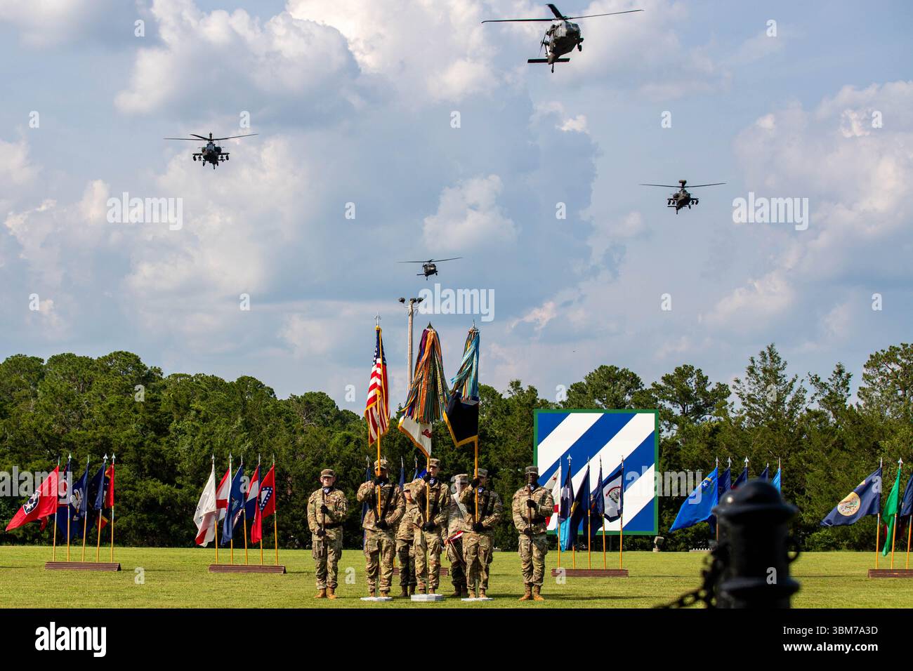Soldiers with the 3rd Infantry Division (3rd ID) present the colors for ...
