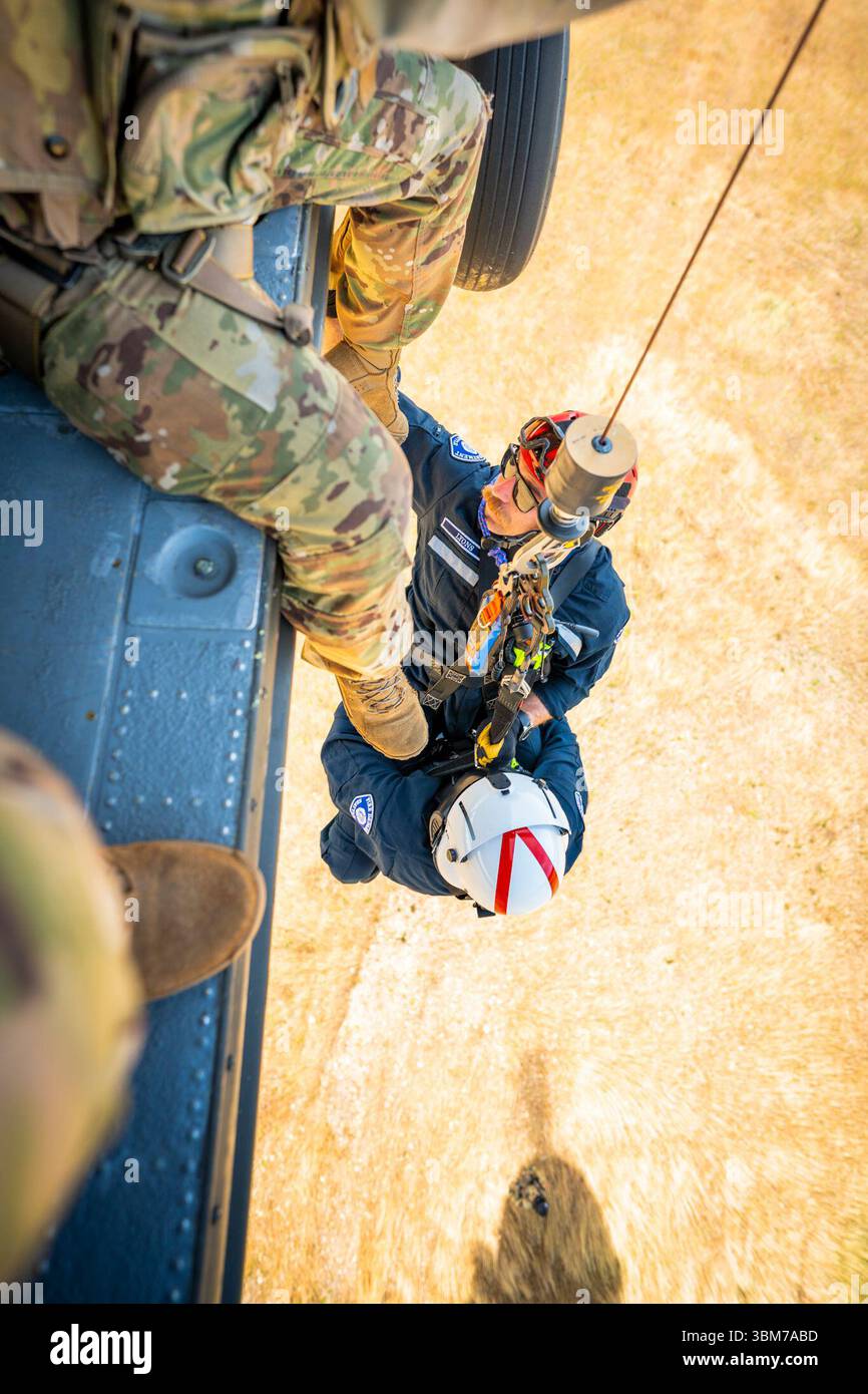 Seattle Fire Department firefighters conduct hoist training with ...