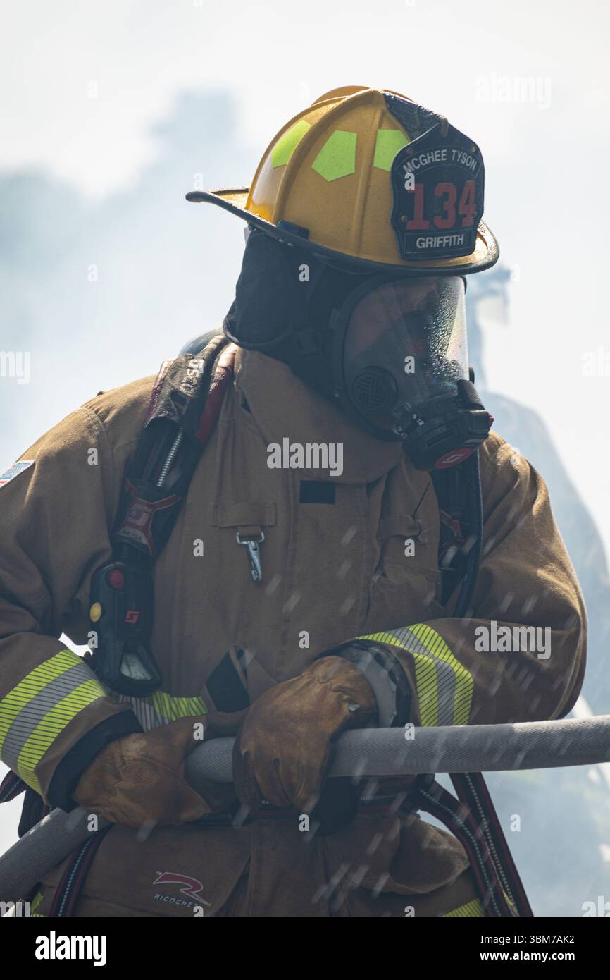 A U.S. Marine Corps Firefighter with Aircraft Rescue Firefighting ...