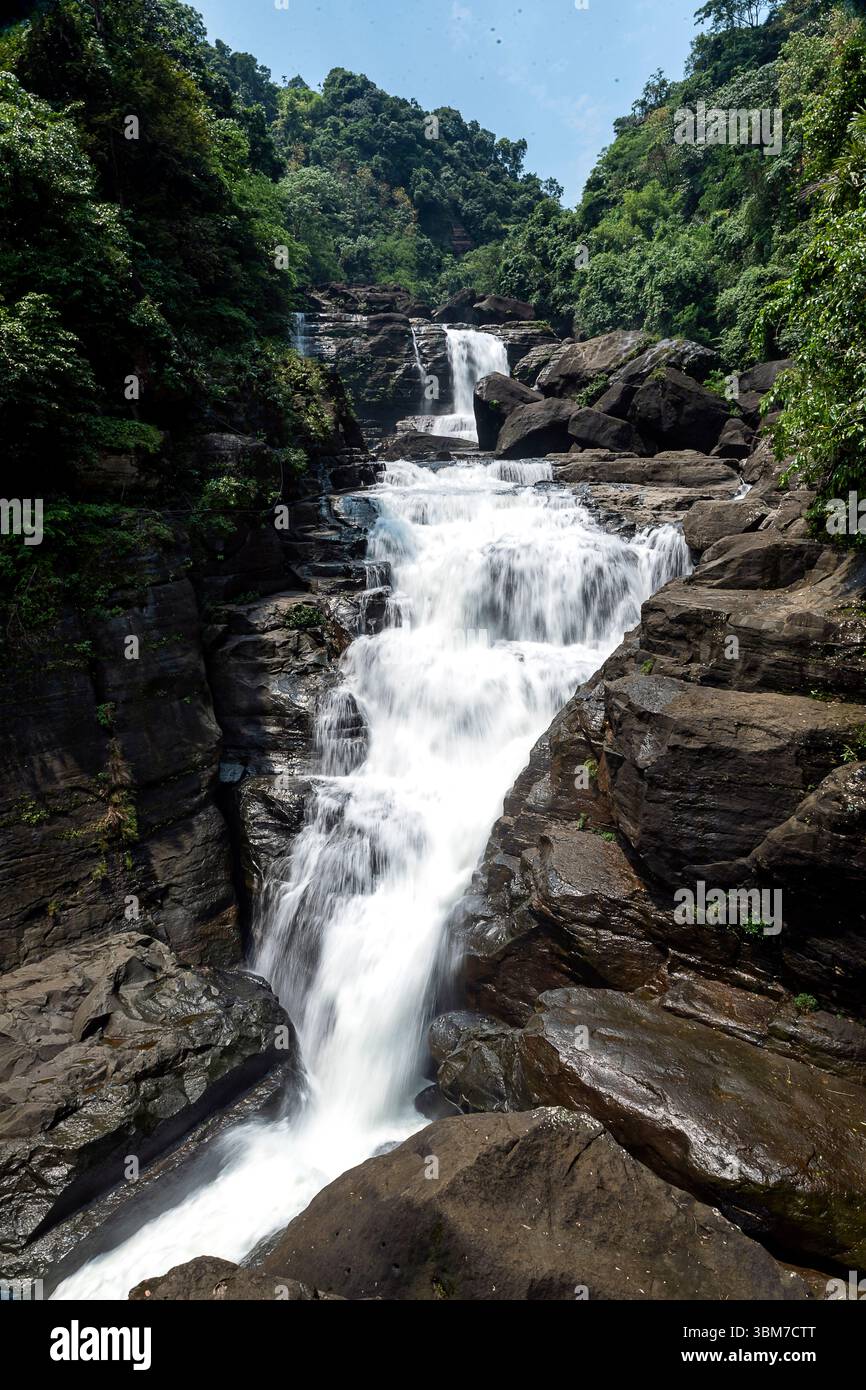 A breathtaking view of Borhill Waterfalls located in the lush green ...