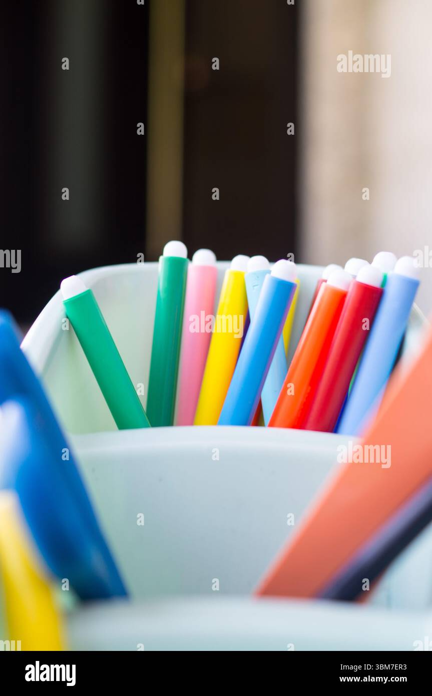 markers of different colors in their containers ready to color Stock ...