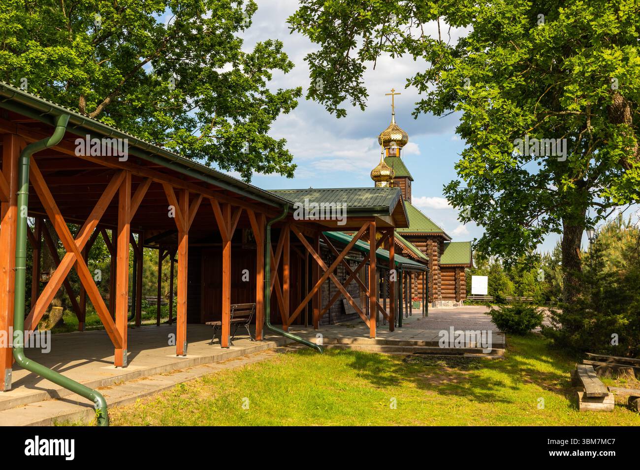 Traditional wooden Orthodox monastery with golden domes in Odrynki ...