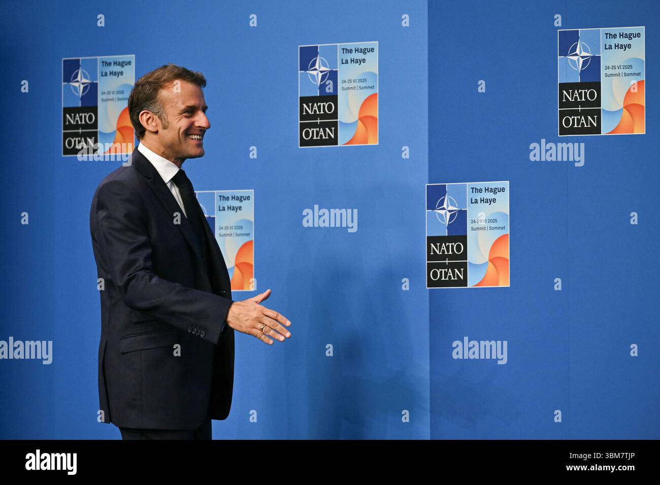 France's President Emmanuel Macron arrives to pose for a picture during ...