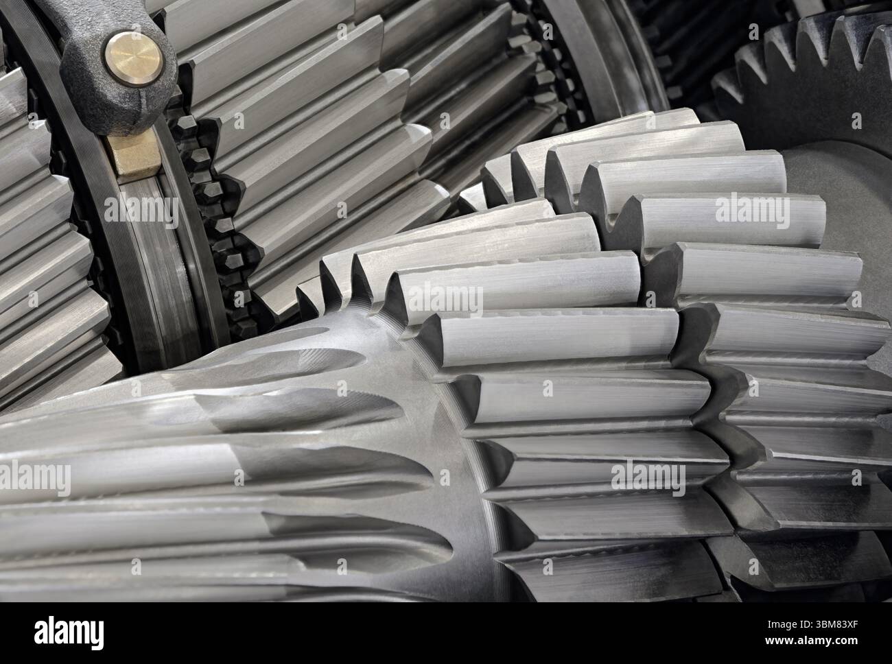 Group of gears inside the gearbox, close up shot, abstract industrial ...