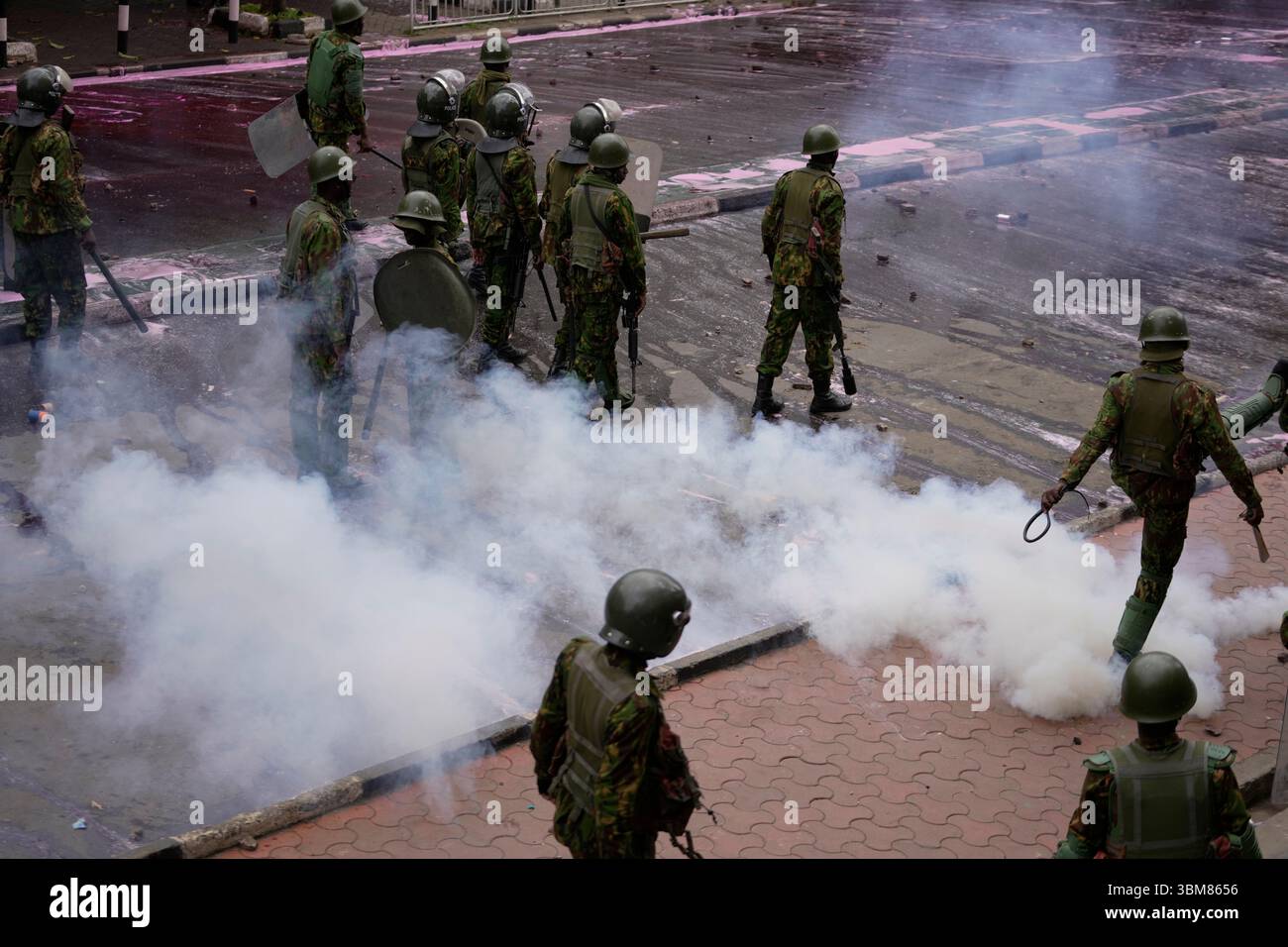 Police fire tear gas at demonstrators protesting on the one-year ...