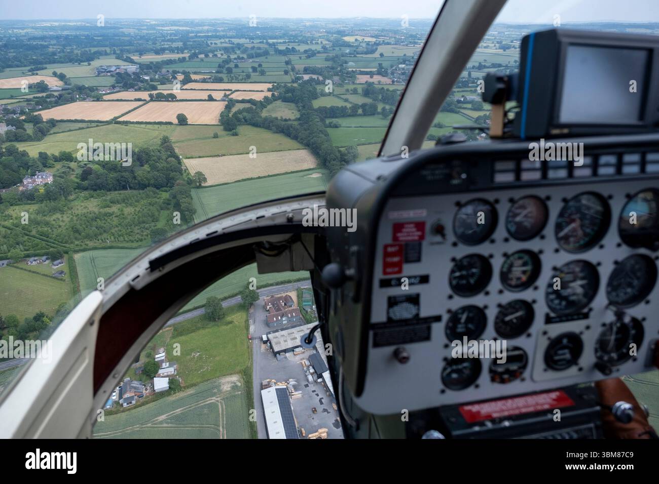 Cockpit view and instrumentation in a Bell Jet Ranger III helicopter at ...