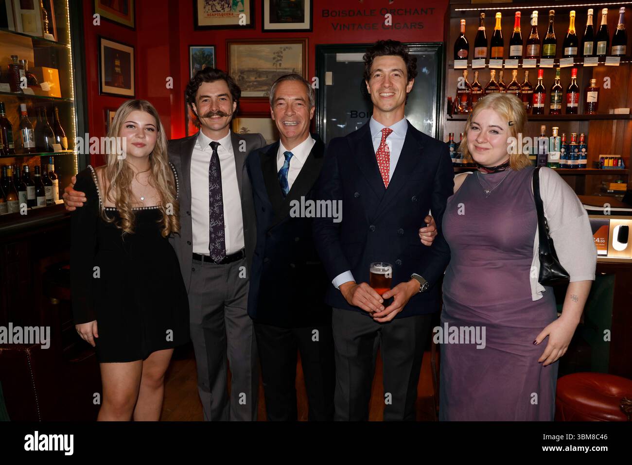 Nigel Farage with his daughters Isabelle and Victoria, his sons Tom and ...
