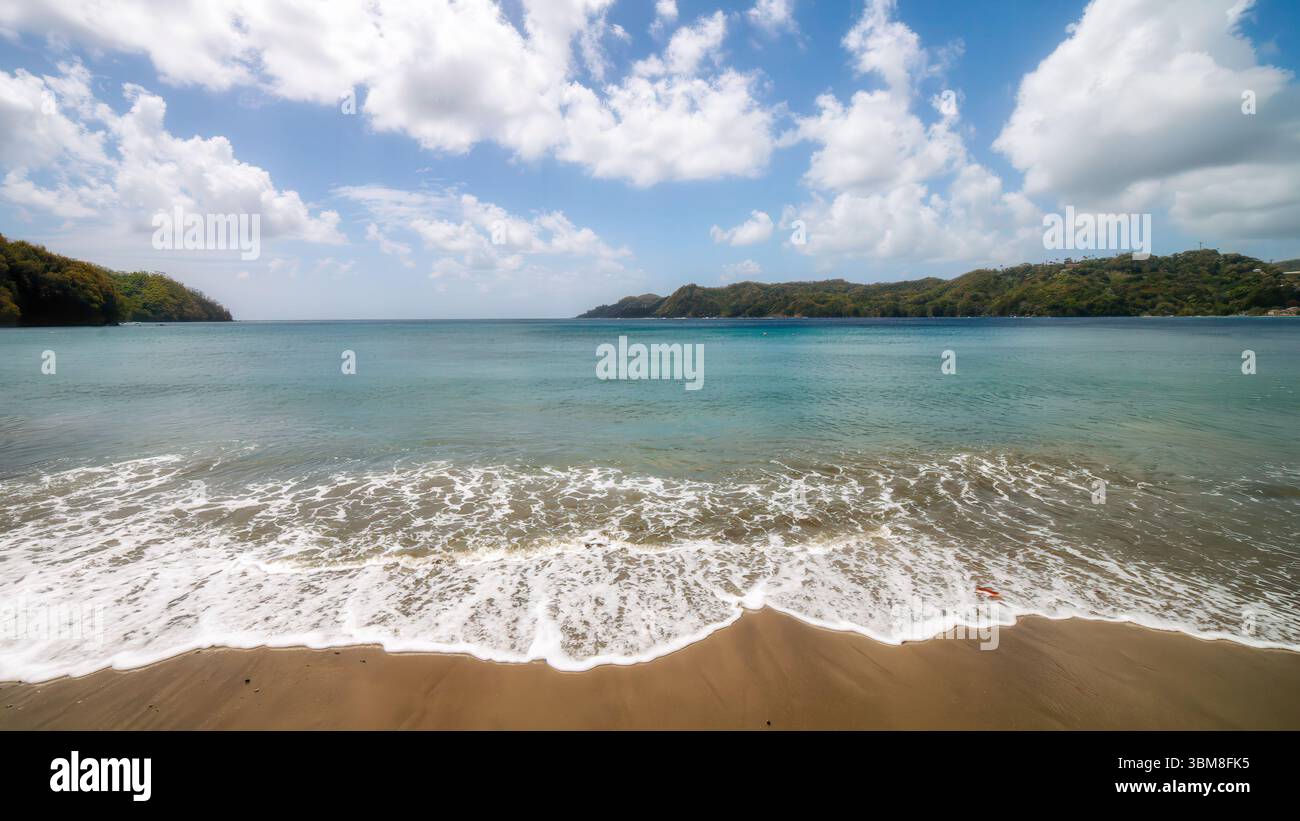 Gentle waves roll onto soft hi-res stock photography and images - Alamy