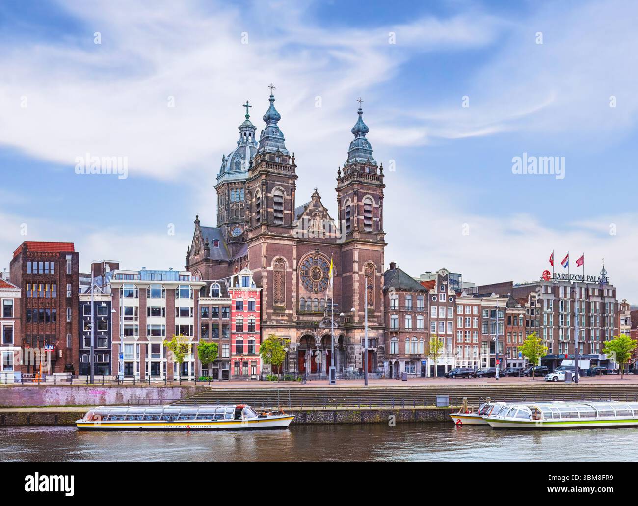 Amsterdam center cityscape with Basilica of Saint Nicholas, tourist ...
