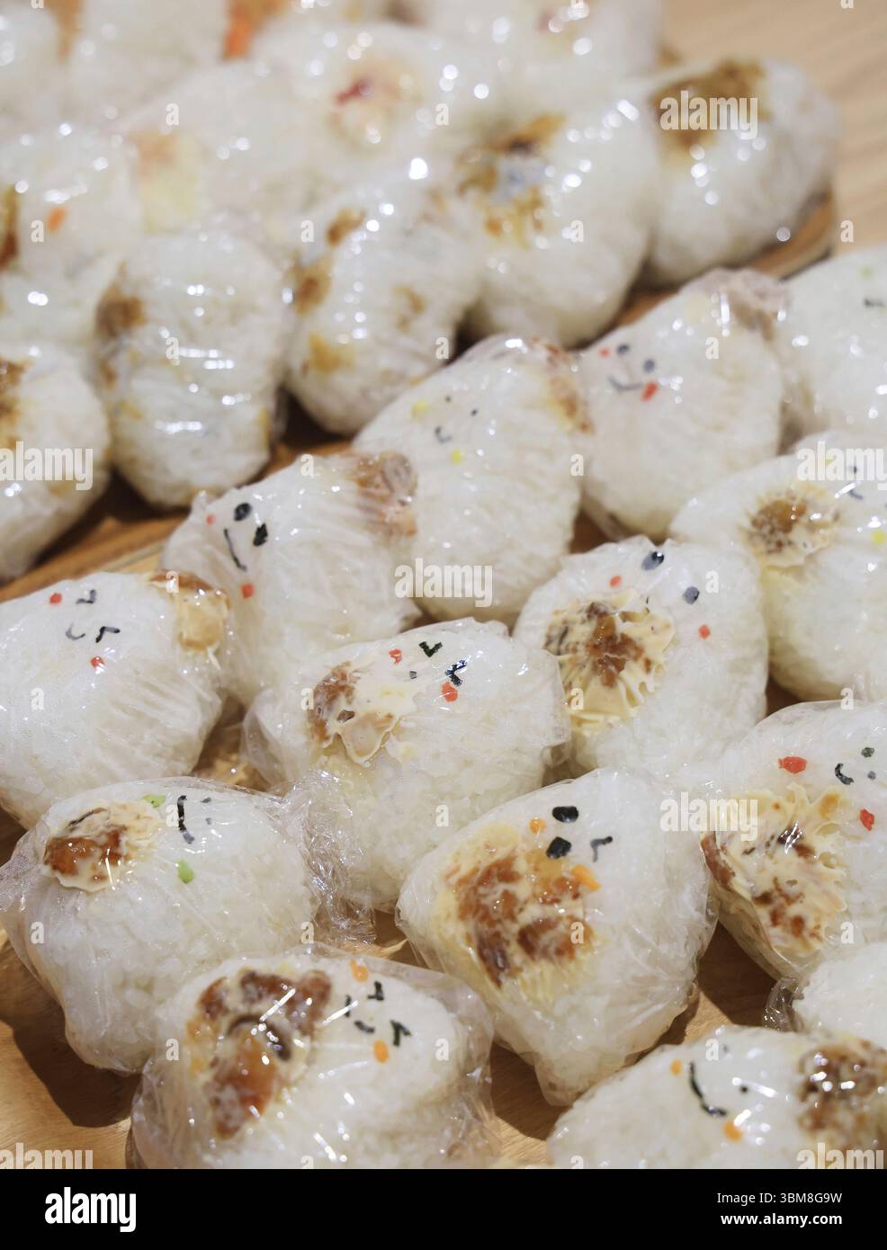A photo shows Onigiri rice balls, which are offered for 10 yen in Otsu ...